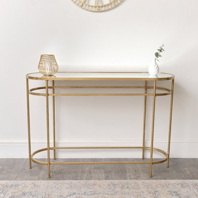 Melody Maison Large Oval Antique Gold Mirrored Console Table by B&Q ...
