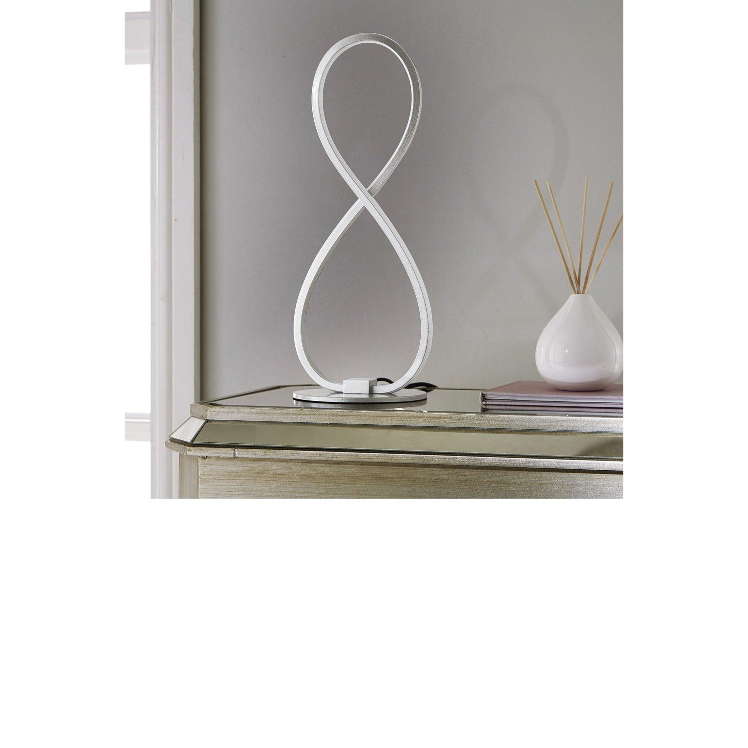 Led Table Lamp in a Figure of Eight Shape in Silver with a Thin Base by ...