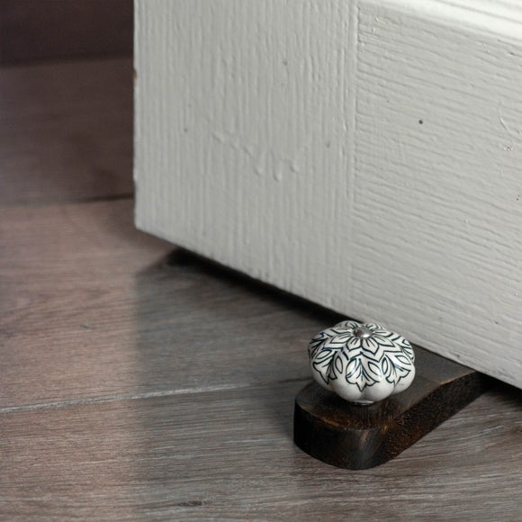 Pack of 4 Nicola Spring Flower Wooden Door Stops by Dunelm | uFurnish.com