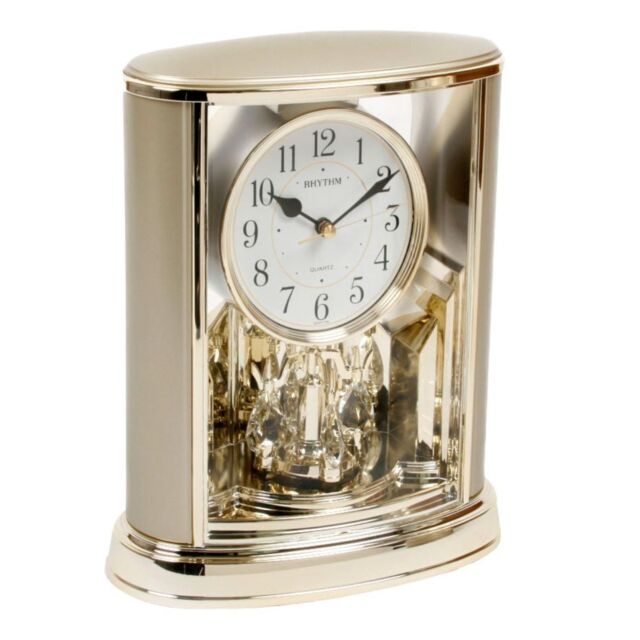 Rhythm Gold Mantel Clock With Rotating Pendulum And Crystals by eBay ...