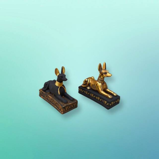 Two Wonderful Statues Of Seated Anubis, One in Black & The Other Gold ...