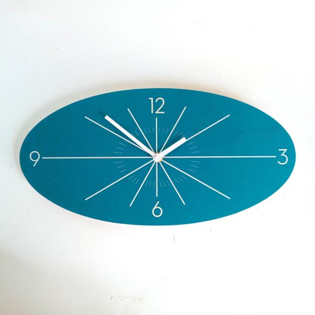 Teal Oval Wooden Wall Clock With Neutra Numbers. Unique Colourful Mid ...