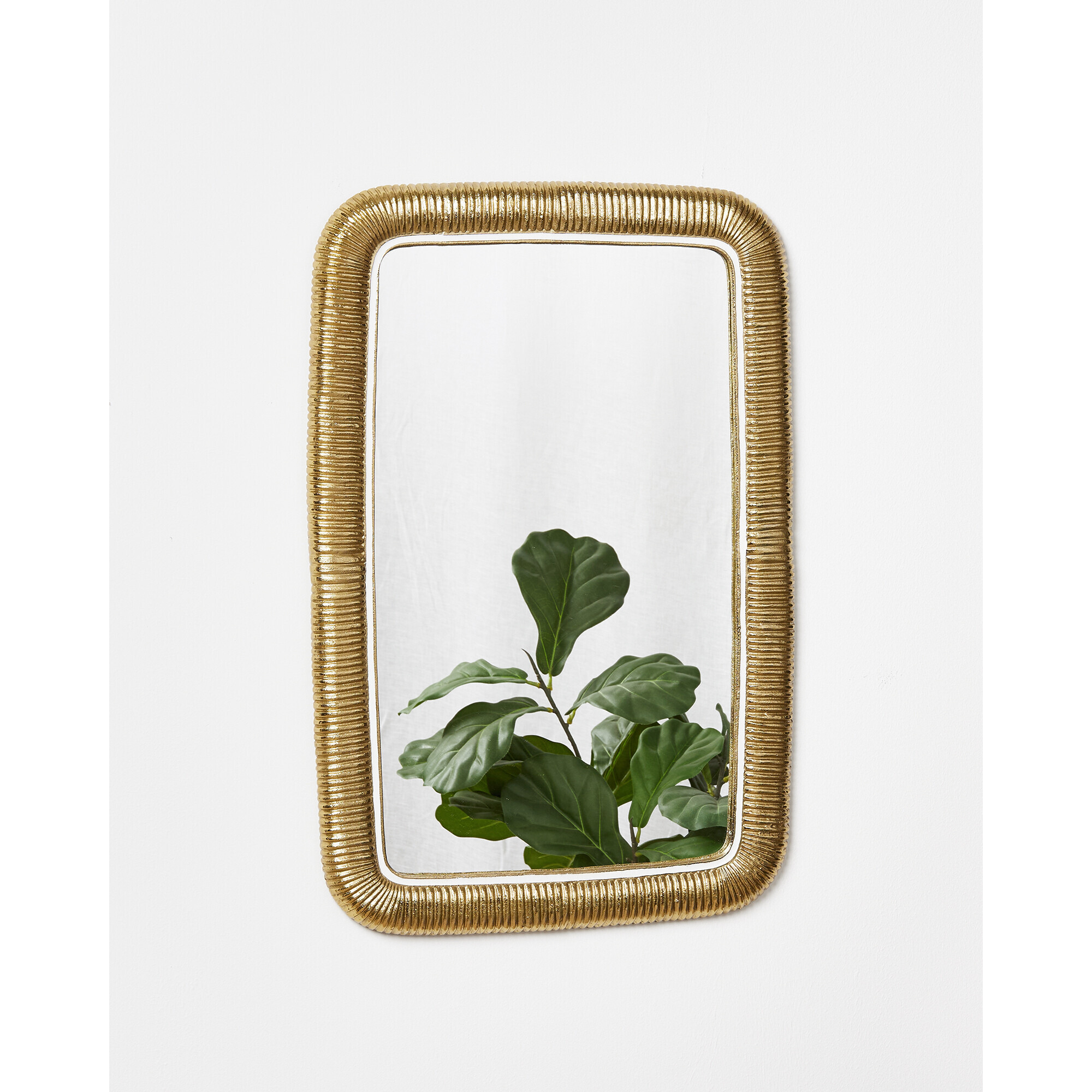 Lucia Ribbed Gold Metal Wall Mirror by Oliver Bonas | ufurnish.com