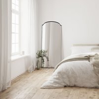 Scooped Arch Lean To Mirror - Black by The Range | ufurnish.com